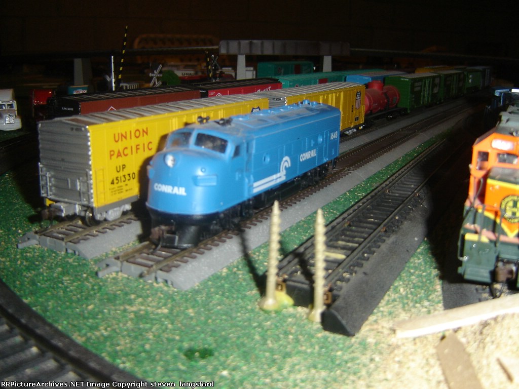 SITTING ON THE ENGINE TRACK